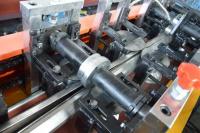 China Galvanized Steel 60MM 70MM Octagonal Pipe Shutter Door Roll Forming Machine for sale