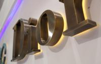 China 304 Stainless Steel Titanium Plated Brushed Gold Backlit Lettering 12mm Acrylic LED Sign for sale