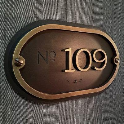 China Custom Size Metal Wall Plaque Anti-Fade Outdoor Signage for Hotel Resort Decoration 2 Year Warranty for sale