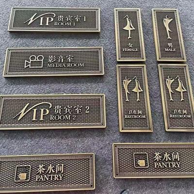 China Custom Embossed Metal Room Sign Brass Identification Plaque with Decorative Border UV Printing 200mm for sale
