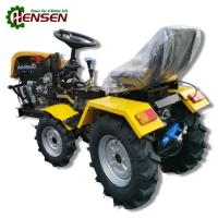 China Diesel Engine Mini Tractor 12HP 4WD Small Farm Tractor with Seat and Reaper for sale