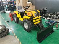 China Diesel 4WD Multi Purpose Small Tractor 12hp with Soil Leveler CE Certified for sale
