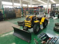 China Diesel 4WD Multi Purpose Small Tractor 12hp with Soil Leveler CE Certified for sale