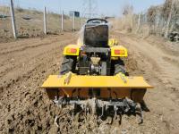 China 12hp to 18hp 4x4 Mini Farm Tractor with Back Rotary Tiller for Small Farms for sale