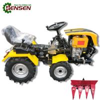 China Diesel Engine Mini Tractor 12HP 4WD Small Farm Tractor with Seat and Reaper for sale