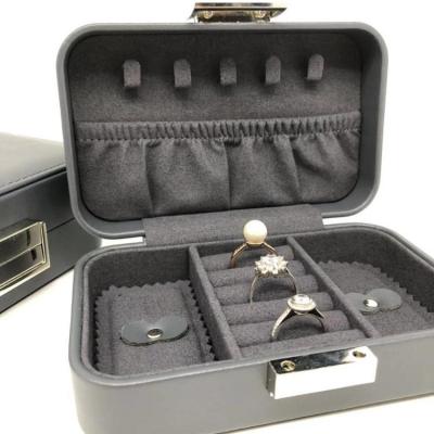 China Small Size Portable Travel Jewelry Box Leather Material With Form Insert for sale