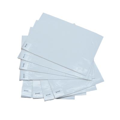 China 18x36 Inch White Sticky Mat for Cleanrooms - 30 Layers with 30-40 Micron Thickness for Dust Control for sale