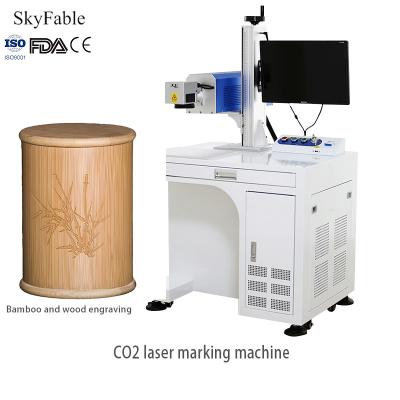 China Permanent Laser Marking Engraving Machine For Leather Fabric Bamboo And Wood Crafts for sale