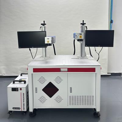 China Dual-head Laser Marking Machine with 1064nm Wavelength, 110mm x 110mm Marking Area, and ± 0.001mm Accuracy for sale