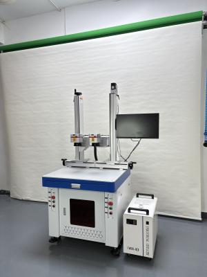 China Dual-head UV Laser Marking Machine with Dual-station Synchronization, 355nm Ultraviolet Laser, and Industrial-grade Reliability for High-speed Marking for sale