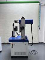 China Four-axis Five-sided Engraving Fiber Laser Marking Machine with 360° Rotation Workbench and ±0.01mm Precision for sale