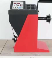 China CE Certified Car Wheel Balancing Machine 100V 230V 200 R/Min for sale