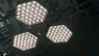 China FDA CE Approval Ceiling Mounted Surgical Light Rotary With Hexagonal Lens for sale