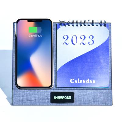 China Custom 2023 New Wireless Charging Funny Electronic Desk Upright Charger Calendars for sale