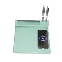 China Custom PU Leather Wireless Charging Foldable Mouse Pad with Magnetic Phone Stand and LED Logo for sale
