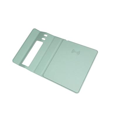 China Custom PU Leather Wireless Charging Foldable Mouse Pad with Magnetic Phone Stand and LED Logo for sale