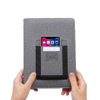 China Waterproof Reusable Wireless Charger Power Bank Notebook With LED Light for sale