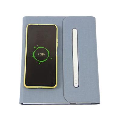 China Foldable Portable Wireless Charging Notebook Diary With Powerbank for sale