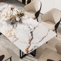 China Sophisticated Marble Dining Table With Shiny Stainless Steel Base for sale