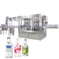 China Glass Packaging Alcohol Bottle Filling Machine 500BPH~10000BPH Liquor Filling Machine for sale