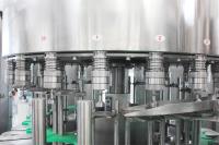 China 400BPH 500BPH Oil Filling Machine Oil Bottle Packing Machine 1500 KG for sale
