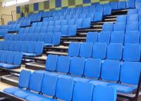 China Power Drive Retractable Tiered Seating Telescopic Platform With Blue Folding Seats for sale