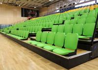 China Gymnasium Retractable Stadium Seating Anti - Slip Plywood Decking With Blow Moulded Seats for sale