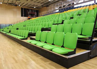 China Gymnasium Retractable Stadium Seating Anti - Slip Plywood Decking With Blow Moulded Seats for sale
