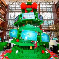 China Revolving Glittering Christmas Tree - Motorized Stainless Steel Showpiece for Shopping Mall Events for sale