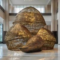 China Golden Woven-Mesh Egg Sculptures with Boat Accent-Stainless Steel Mascot Art Installation for Luxury Interiors for sale