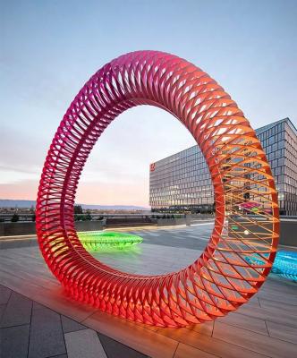 China Large Outdoor Spiral Ring Sculpture - Color Gradient Metal Art Installation for Commercial Landscape Lighting for sale
