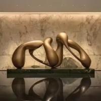 China Dynamic Fluid Gold Metal Sculpture Handcrafted Abstract Art For Garden Hotel Lobby for sale