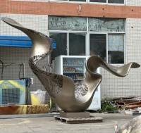 China Laser Cut Leaf Pattern Abstract Metal Sculpture With Wave Design Modern Stainless Steel Art for sale
