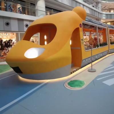 China Custom Yellow Cartoon Train Resin Sculpture with Environmental Protection Resin and 30-Year Quality Guarantee for Indoor Playgrounds for sale