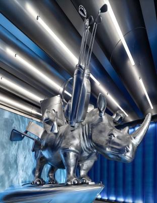 China Metallic Rhino Sculpture with Travel Luggage Set-Artistic Resin Statue for Modern Interior Office Cemetery Decor for sale