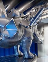 China Metallic Rhino Sculpture with Travel Luggage Set-Artistic Resin Statue for Modern Interior Office Cemetery Decor for sale