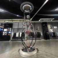 China Custom Retail Shopping Mall Lobby LED Orbit Ring Installation Chrome Display Steel Acrylic Cyber Angel Robot Female Mascot for sale