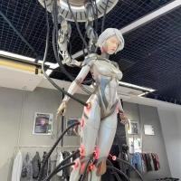 China Custom Retail Shopping Mall Lobby LED Orbit Ring Installation Chrome Display Steel Acrylic Cyber Angel Robot Female Mascot for sale