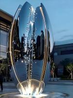 China Mirror Polished Stainless Steel Hand Forged Waterfall Column Sculpture With Mascot Theme for sale