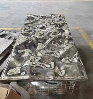 China Wave Design Stainless Steel Glass Coffee Table Modern Living Room Centerpiece for sale