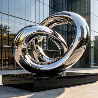 China Mirror Polished 304 Stainless Steel Public Art Sculpture with Intertwined Double Helix Structure and Black Solid Granite Base for sale