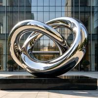 China Mirror Polished 304 Stainless Steel Public Art Sculpture with Intertwined Double Helix Structure and Black Solid Granite Base for sale