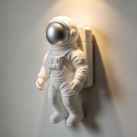 China Premium Resin 3D Astronaut Wall Sconce with Automotive Grade Paint and Built-in LED Warm Light for Customized Space Themed Decor for sale