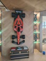 China Custom Wall-Mounted Fiberglass Formula 1 Model, Wear-Resistant Racing Sculpture for Gallery & Mall Decor for sale