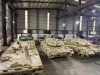 China Giant Stainless Steel Armored Vehicle Landscape Sculpture for sale