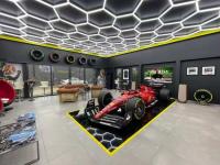 China Life Size High-Strength Fiberglass Racing Car Sculpture with Dynamic Aerodynamic Design for sale