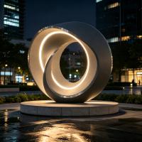 China Original LED Ring Sculpture with Double-Curved Streamline Design and IP65 Waterproof Integrated Light Strips for Landscape Art for sale