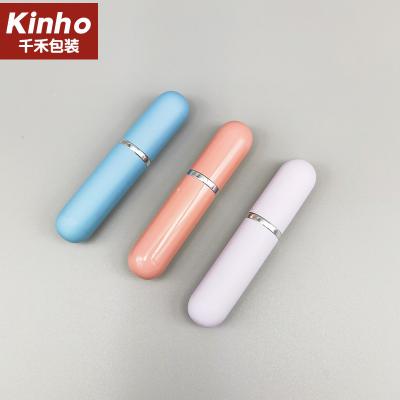 China Portable Bullet Empty Perfume Bottles Metal Aluminum Rotating 5ml Glass Spray Bottle for sale