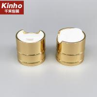 China Luxury Cosmetic Gold Aluminum Press Disc Top Cap 28/410 Metal Shell For Shampoo Bottle for sale
