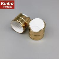 China Luxury Cosmetic Gold Aluminum Press Disc Top Cap 28/410 Metal Shell For Shampoo Bottle for sale